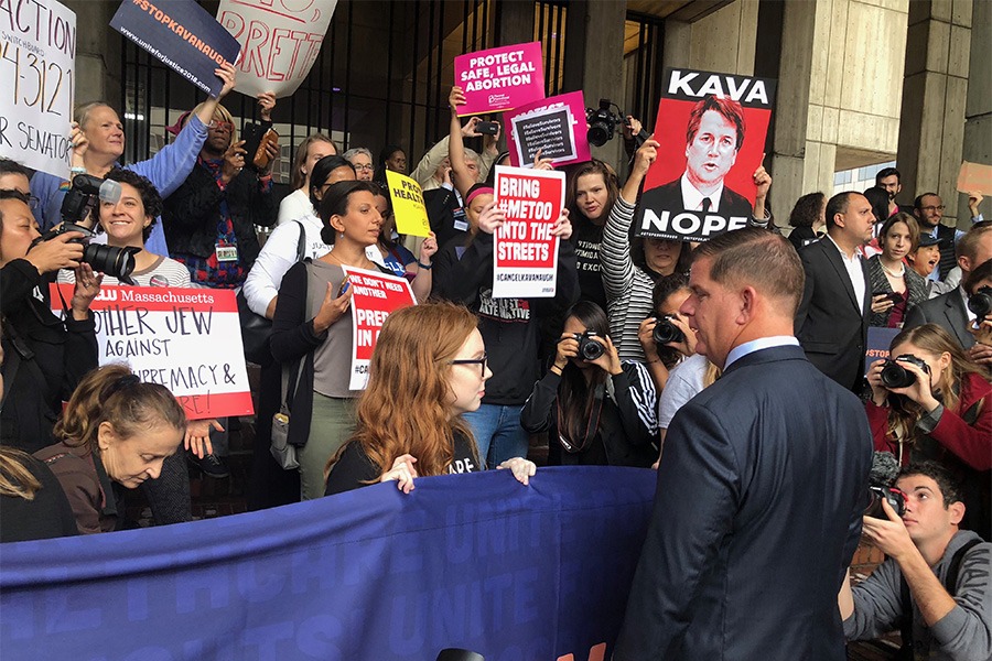 Protesters Greet Jeff Flake as He Makes an Appearance in Boston Protesters Greet Jeff Flake as He Makes an Appearance in Boston